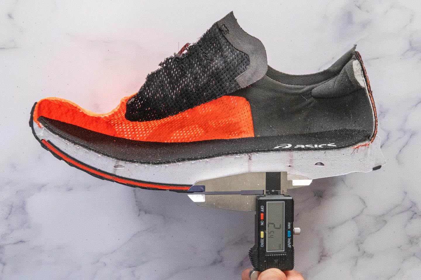 Cut in half: ASICS Magic Speed Review | RunRepeat