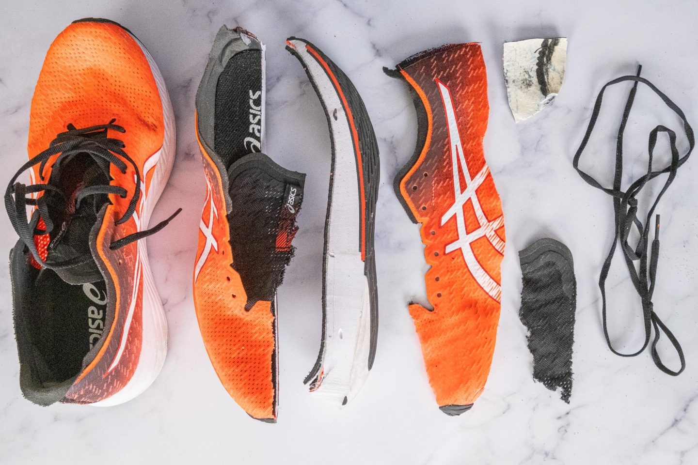 Cut in half: ASICS Magic Speed Review | RunRepeat