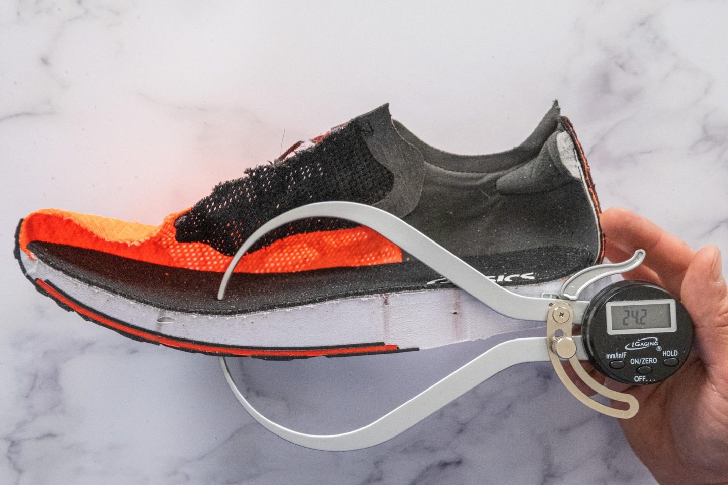 Cut in half: ASICS Magic Speed Review | RunRepeat