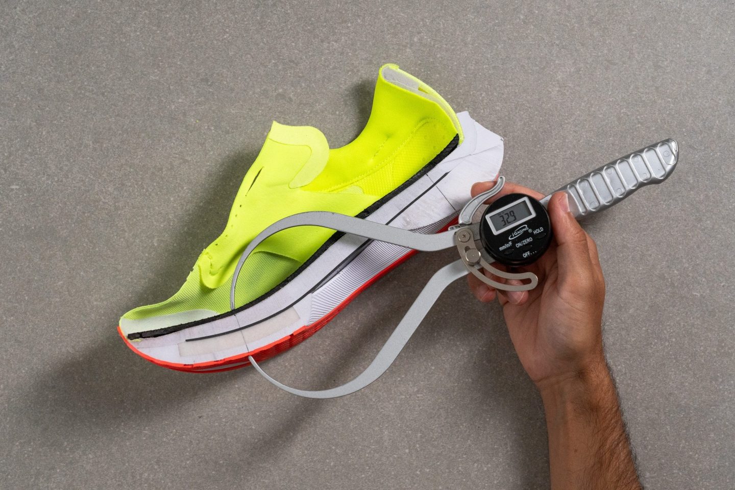 Cut in half: ASICS Magic Speed 4 Review | RunRepeat
