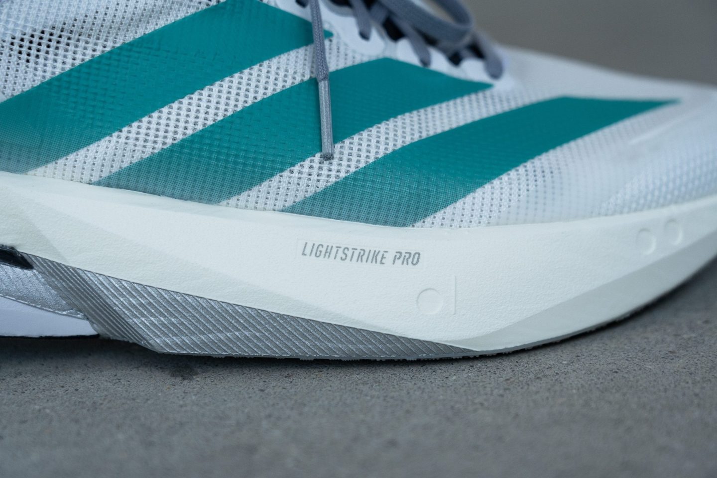 Cut in half: Adidas Adizero Boston 13 Review (2025) | RunRepeat